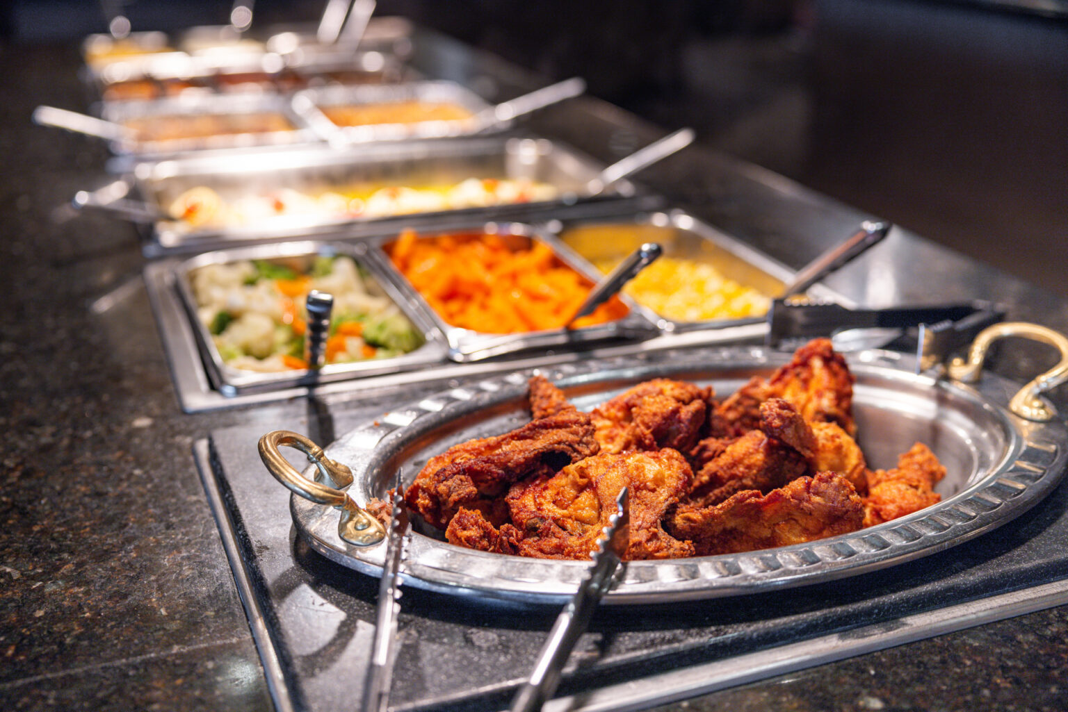 One of the hot bars at Miller's Smorgasbord - Miller's Smorgasbord